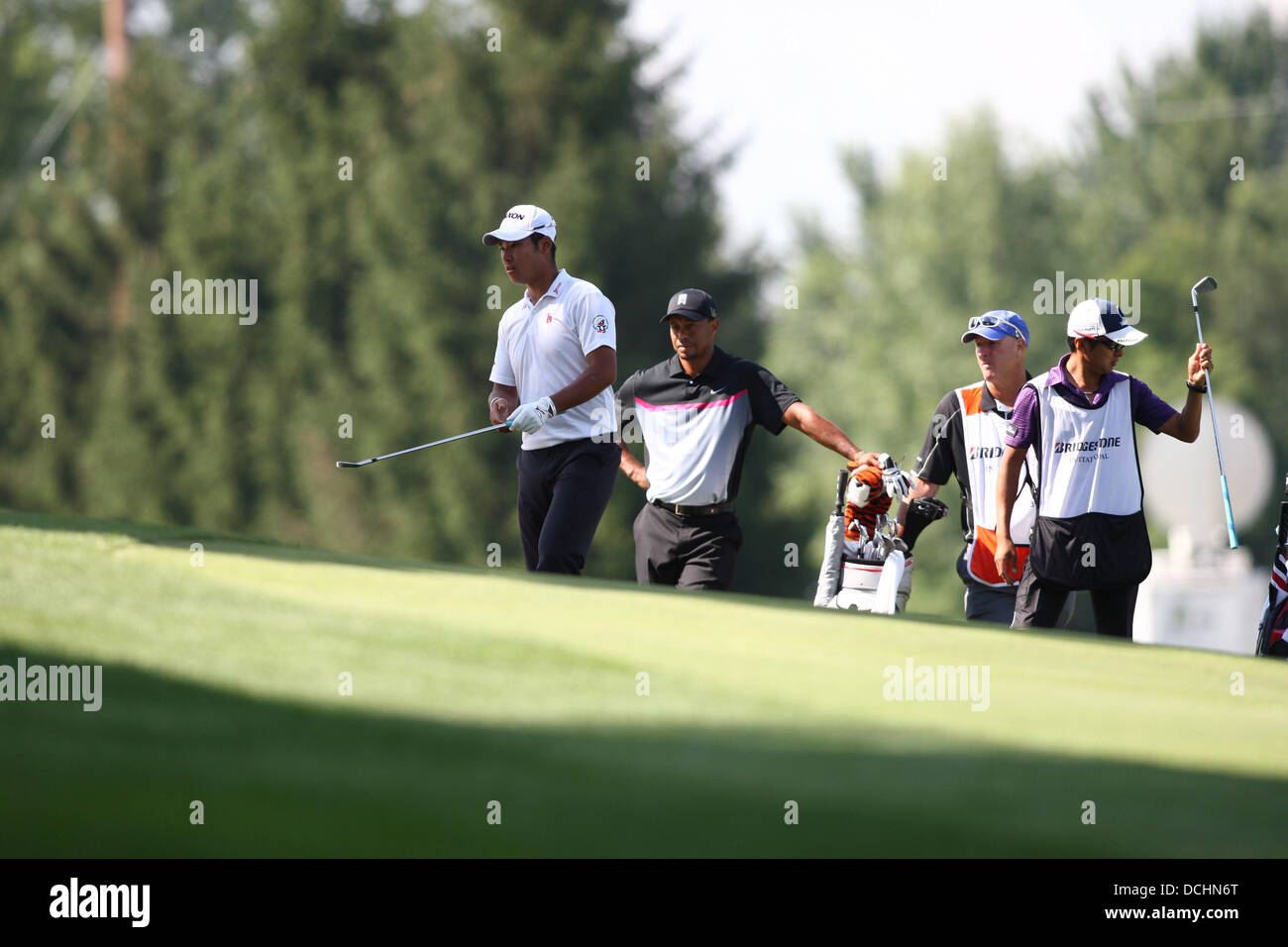 (L-R) Hideki Matsuyama (JPN), Tiger Woods (USA), Joe LaCava, Daisuke ...