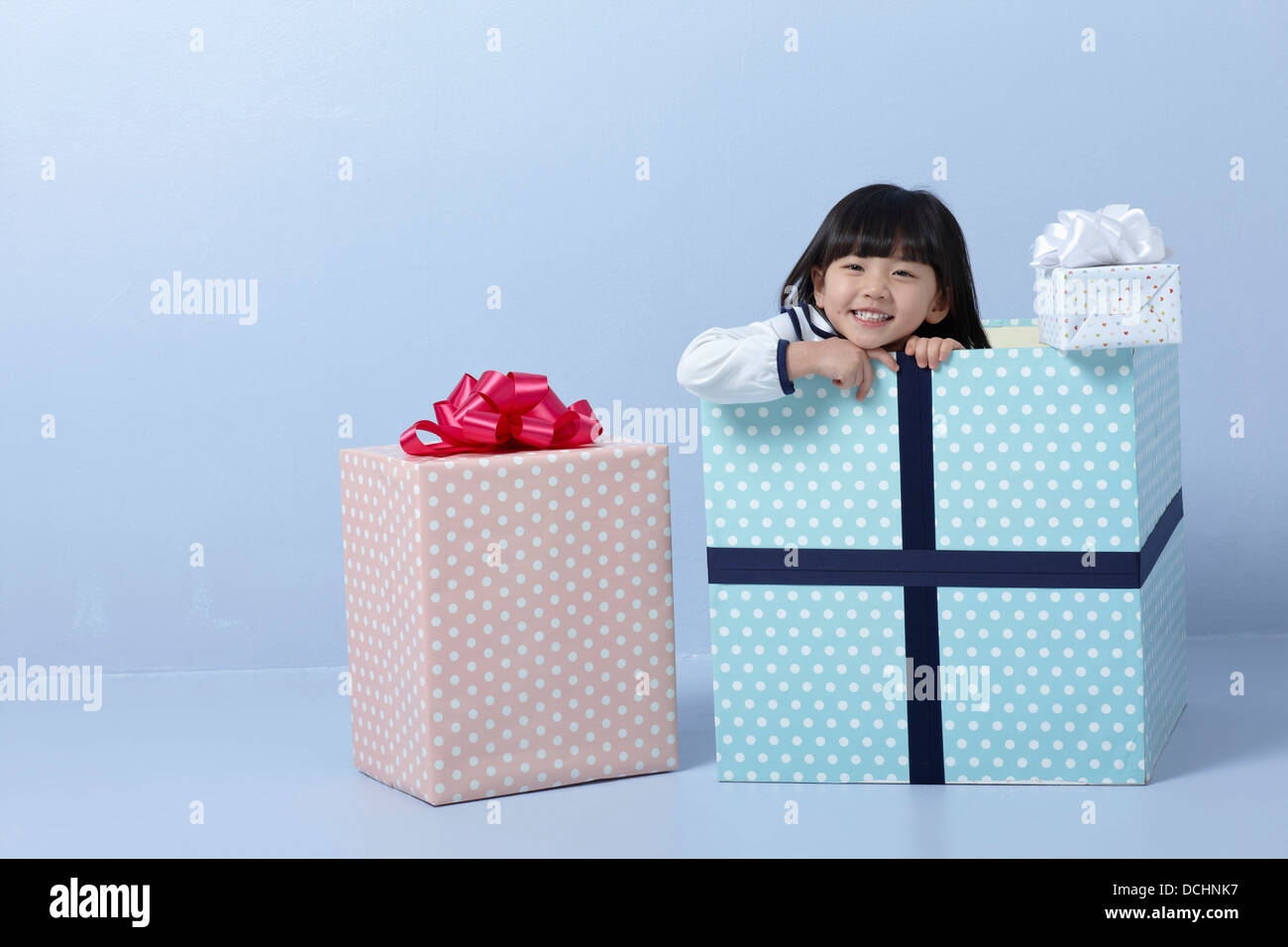 a girl inside a present Stock Photo - Alamy