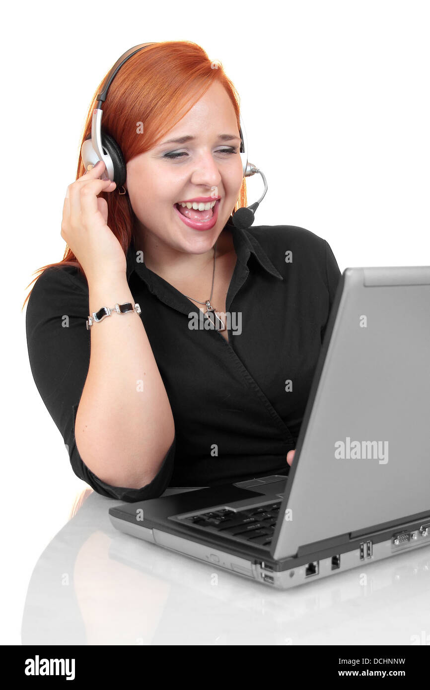 Portrait of happy smiling cheerful young support phone operator in headset with laptop, isolated ...