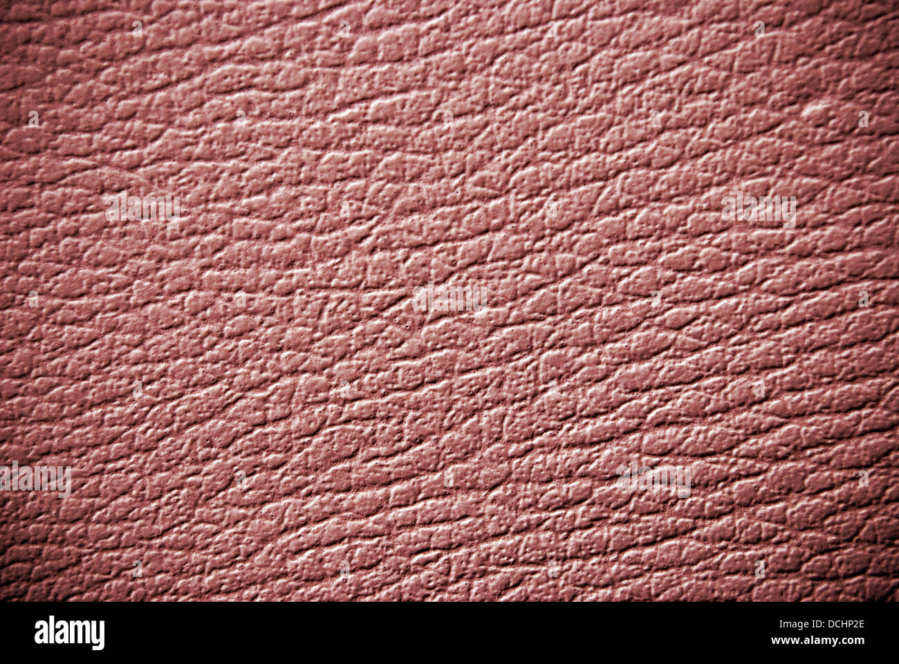 Red synthetic colored or tinted leather texture or background Stock ...