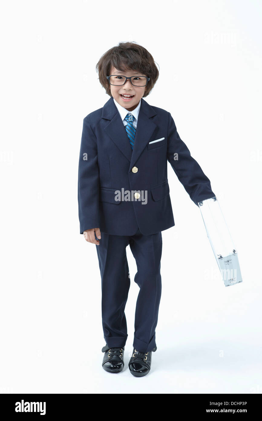 a boy dressed up as a business man Stock Photo - Alamy