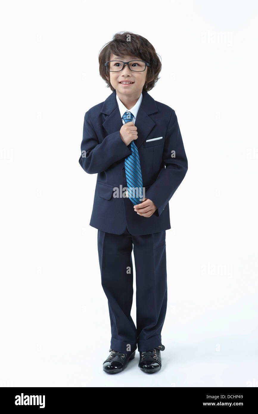a boy dressed up as a business man Stock Photo - Alamy