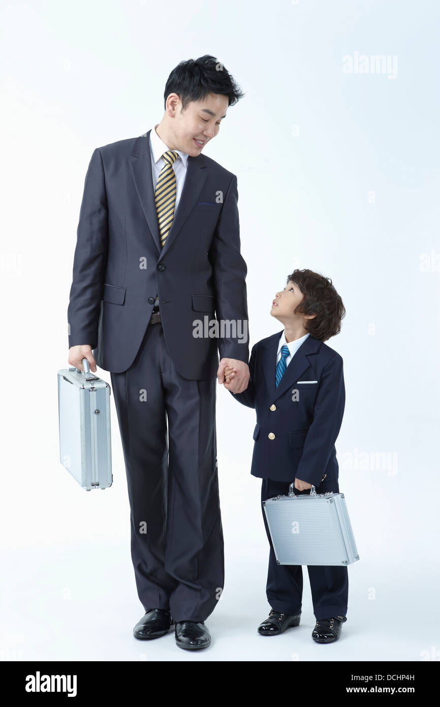 Businessman with his son in the studio hi-res stock photography and ...