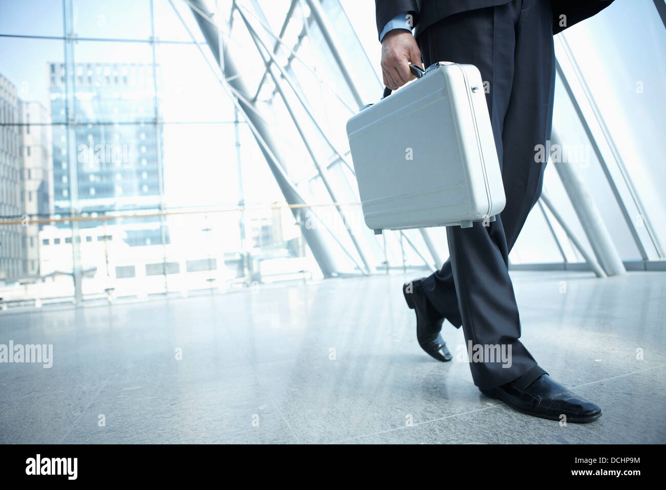 a business man walking Stock Photo - Alamy