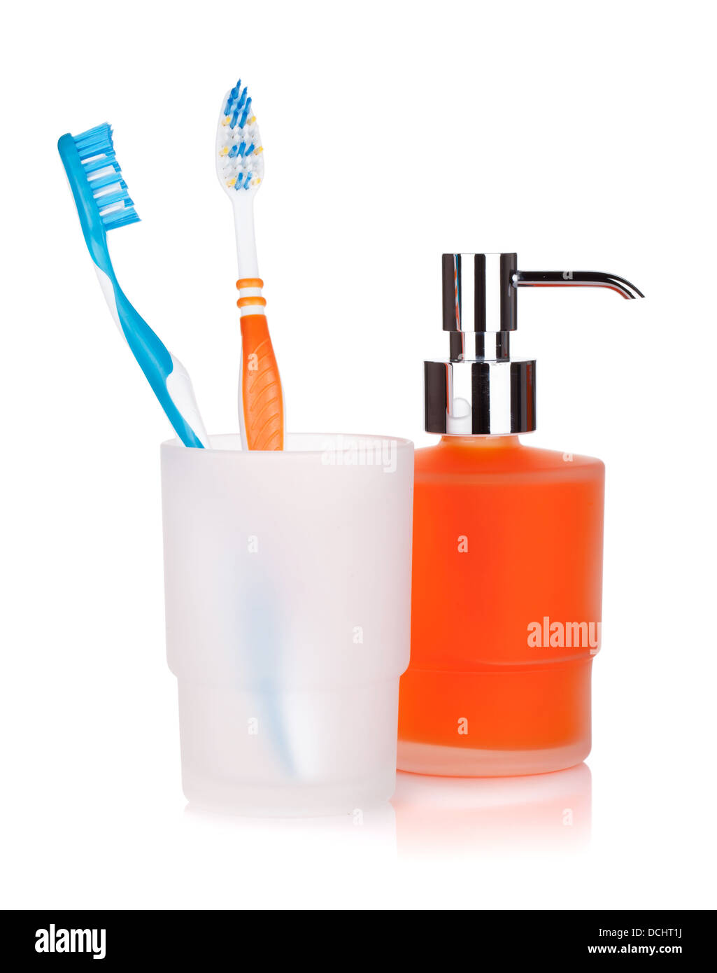 Two colorful toothbrushes and liquid soap. Isolated on white background ...