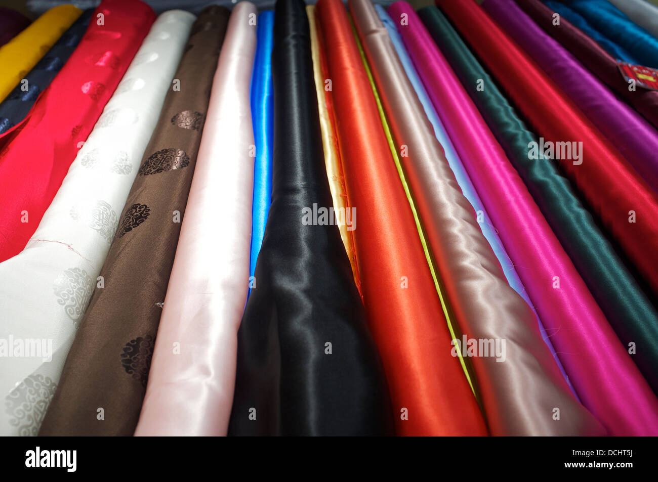 Silk are on sale in Xianxiangyi silk store in Beijing, China. 2013 ...
