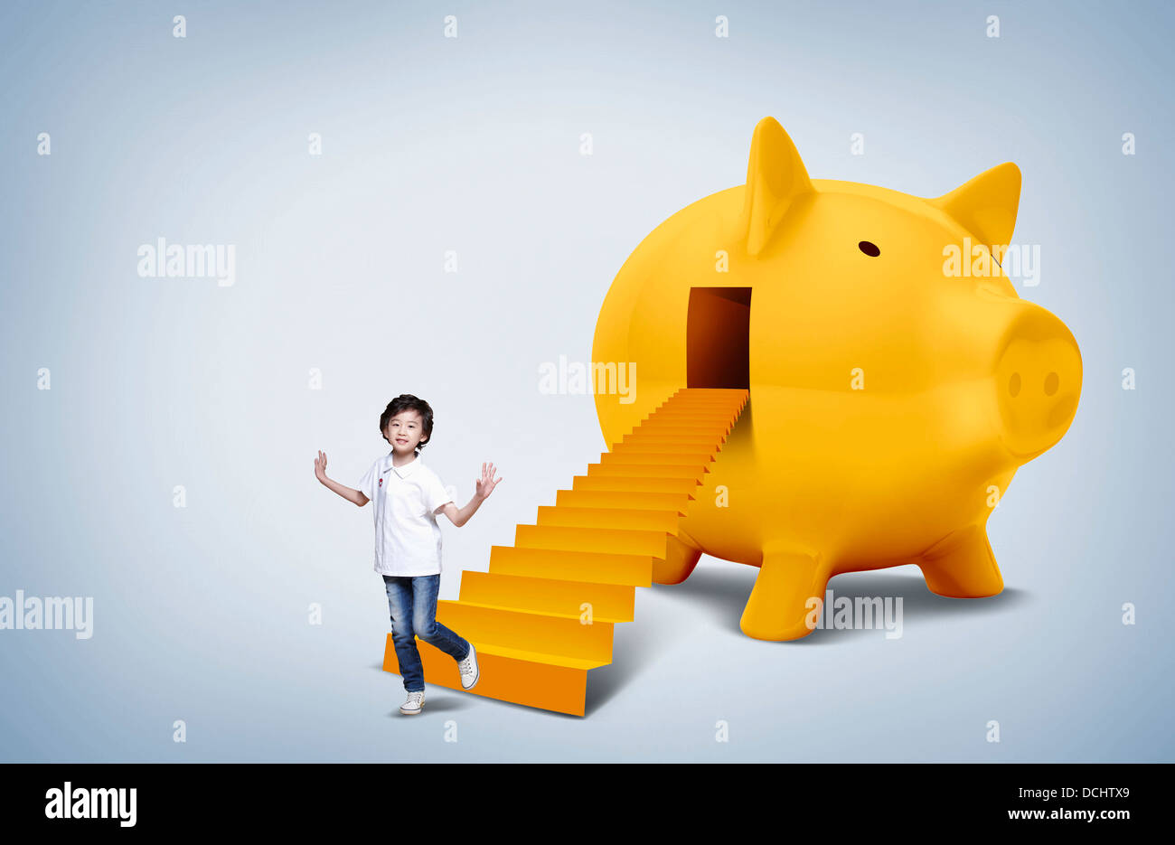 a boy coming out from a piggy bank Stock Photo - Alamy
