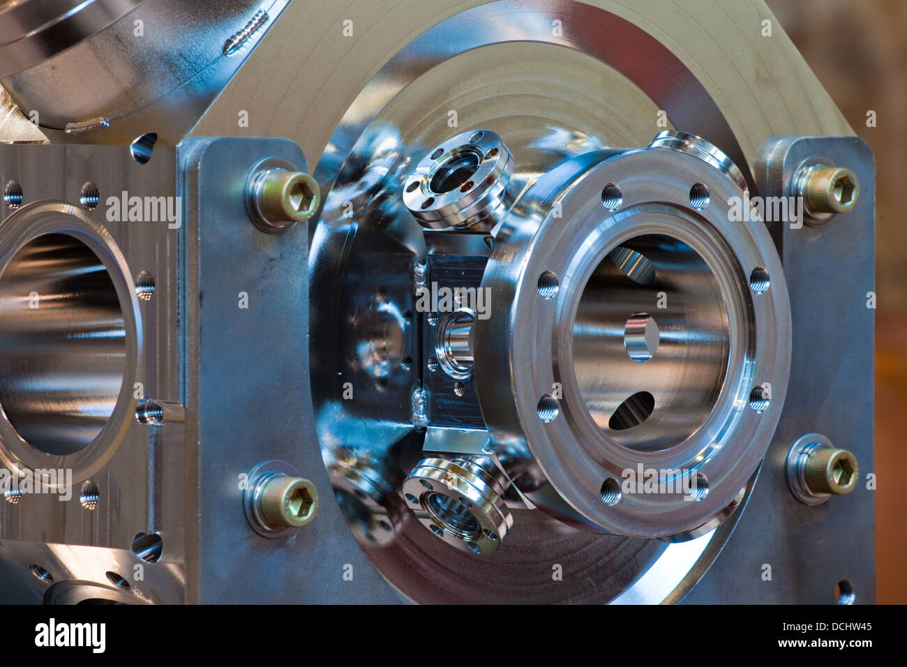 Precision machined component for use in a particle accelerator beam ...