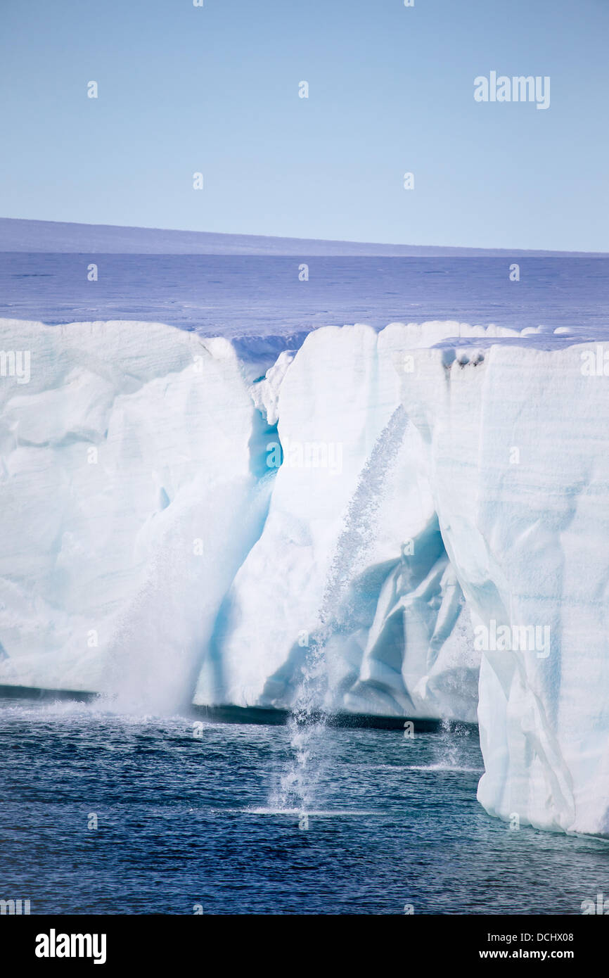 meltwater runs out of glacier Stock Photo - Alamy