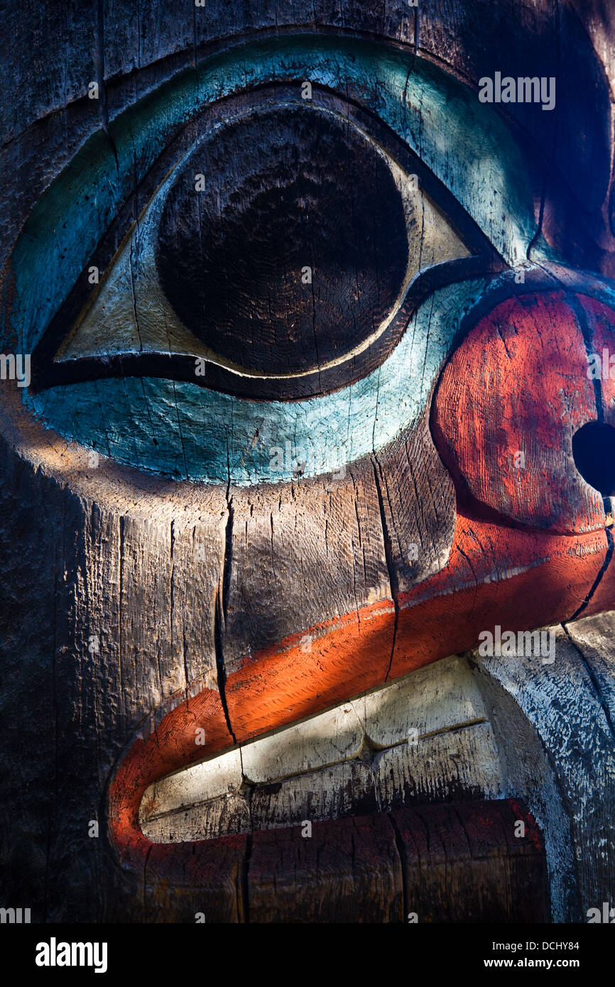 Partial detail of a totem in the shade of trees, Victoria, Canada Stock ...