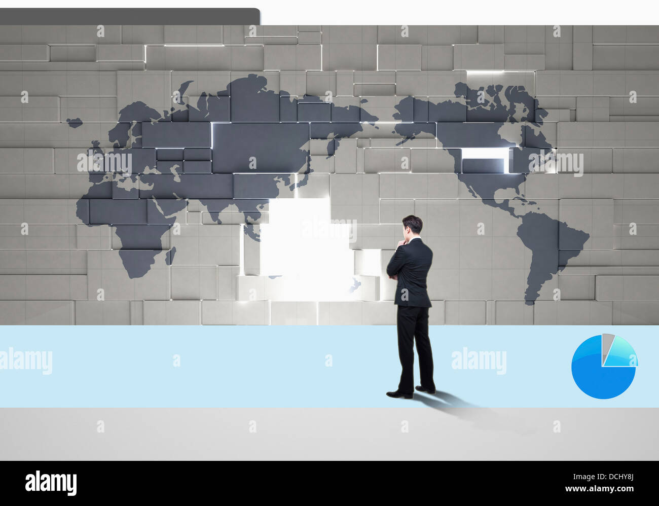 a man looking at the world map Stock Photo - Alamy