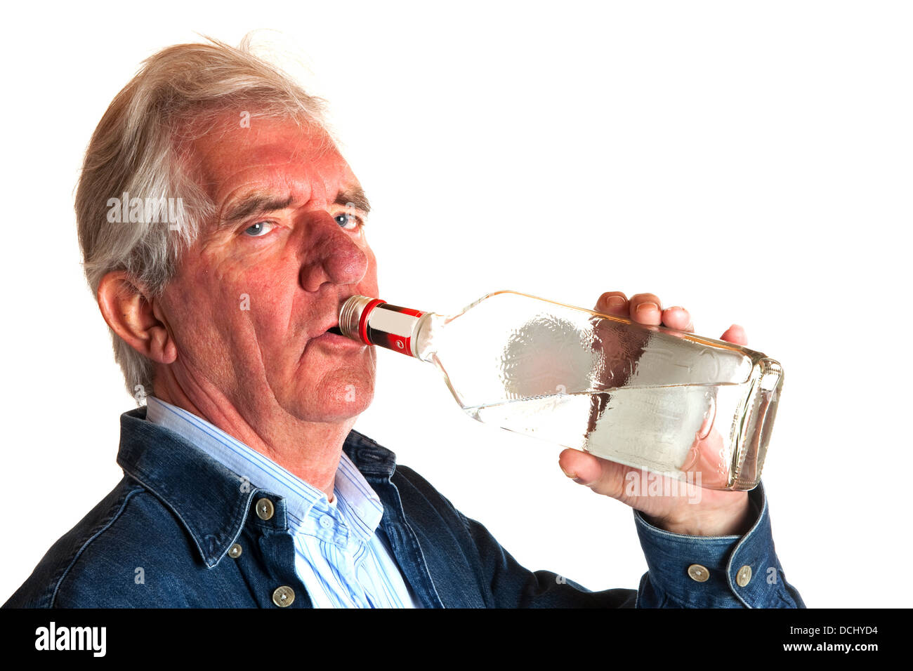 Senior man drinking alcohol hi-res stock photography and images - Alamy