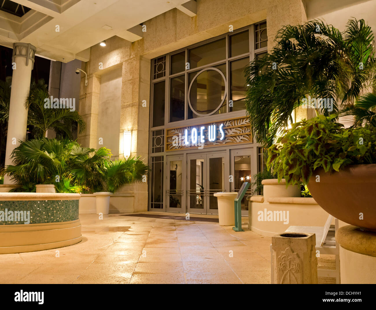 Side entrance of Loews hotel Miami Beach in the evening, after a rain ...