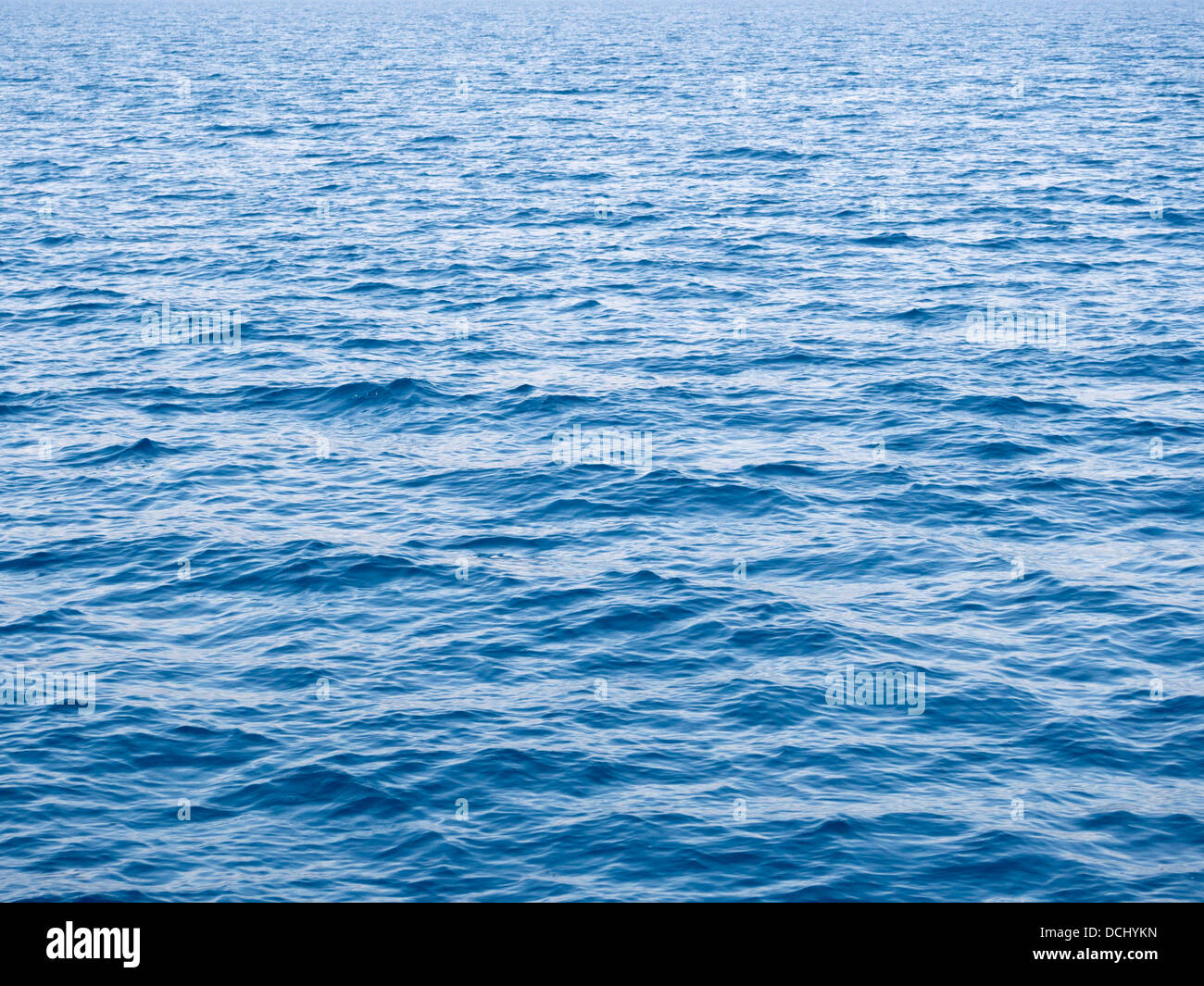 endless blue sea waves background Stock Photo - Alamy