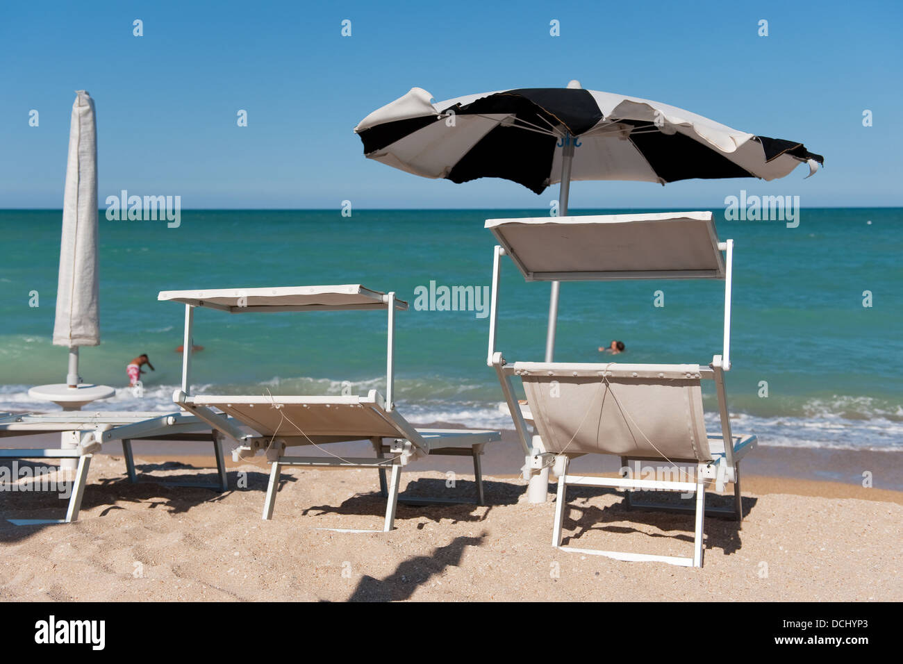beach with sun beds Stock Photo - Alamy