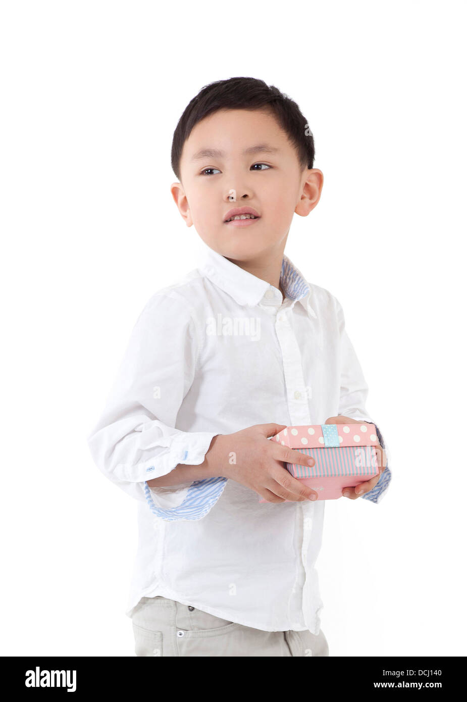 The little boy holding a gift box Stock Photo - Alamy