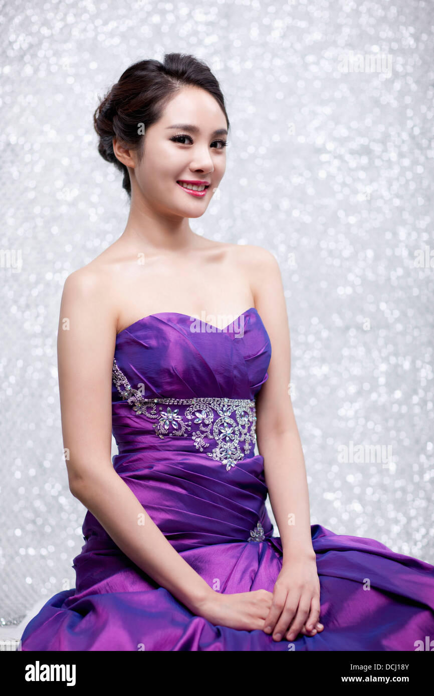 Woman gracefully holding real hi-res stock photography and images - Alamy