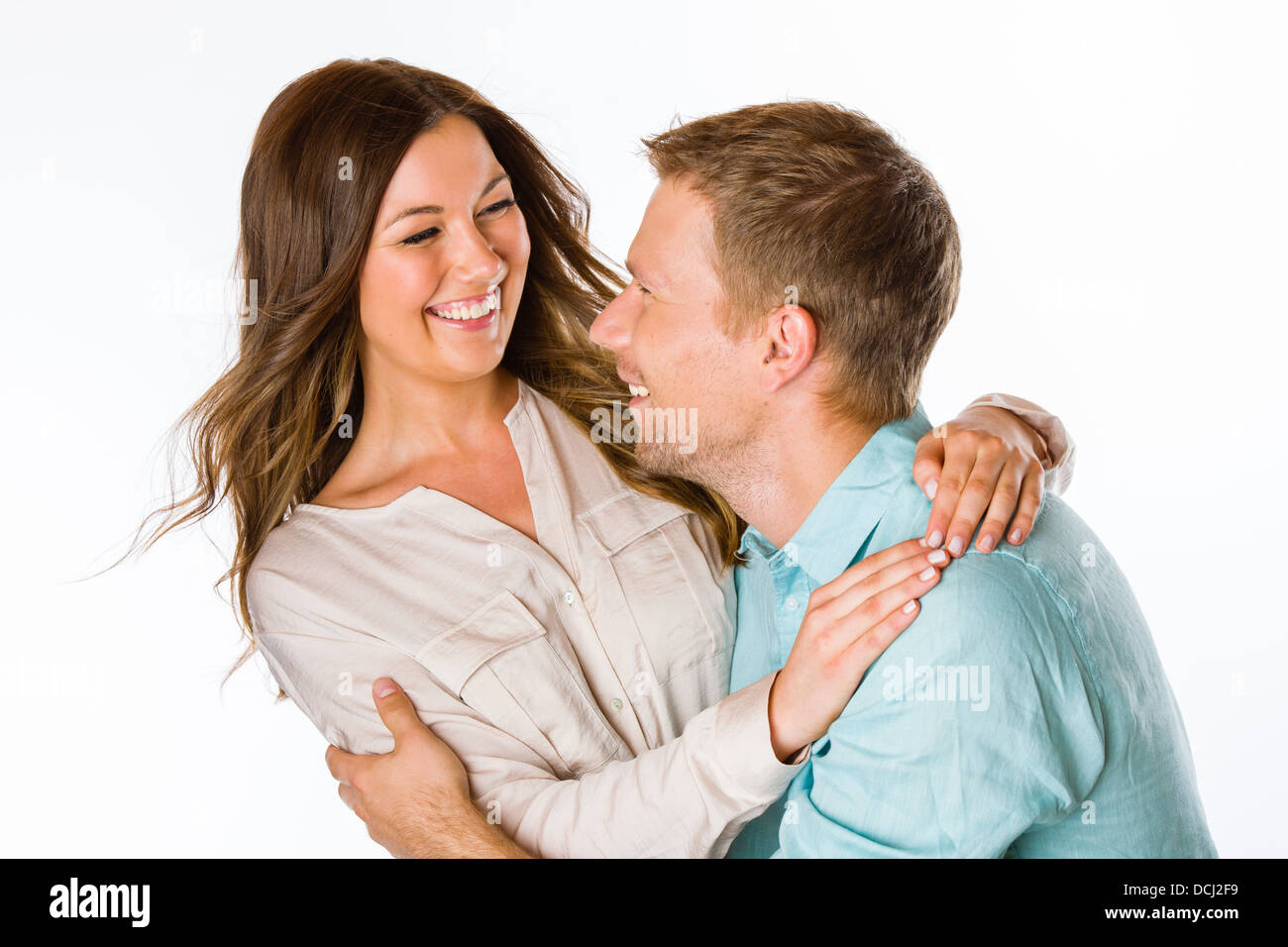 Lovely attractive couple together, studio shot, white background Stock ...