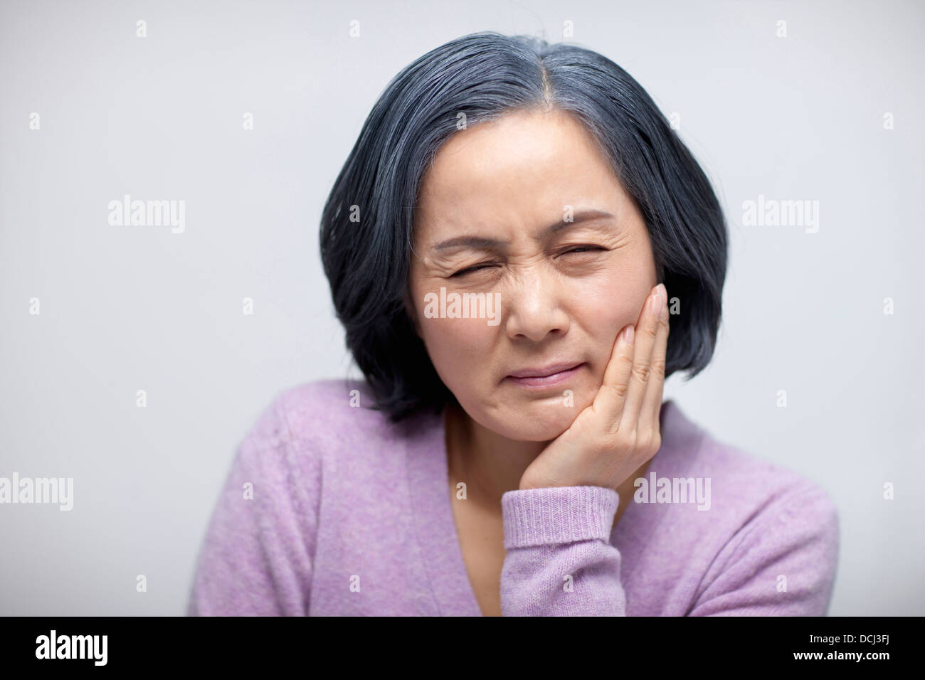 close up shot of middle aged woman with awful face Stock Photo - Alamy