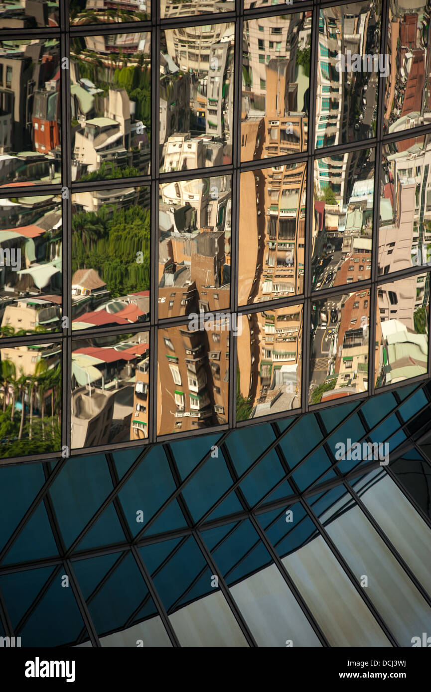 Reflections of the city of Taipei, Taiwan as seen in the windows of a ...