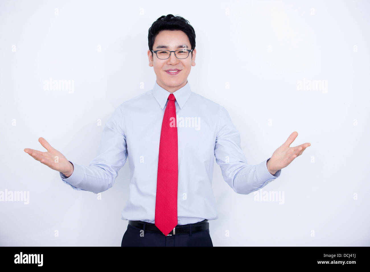 a businessman using hand gesture Stock Photo - Alamy