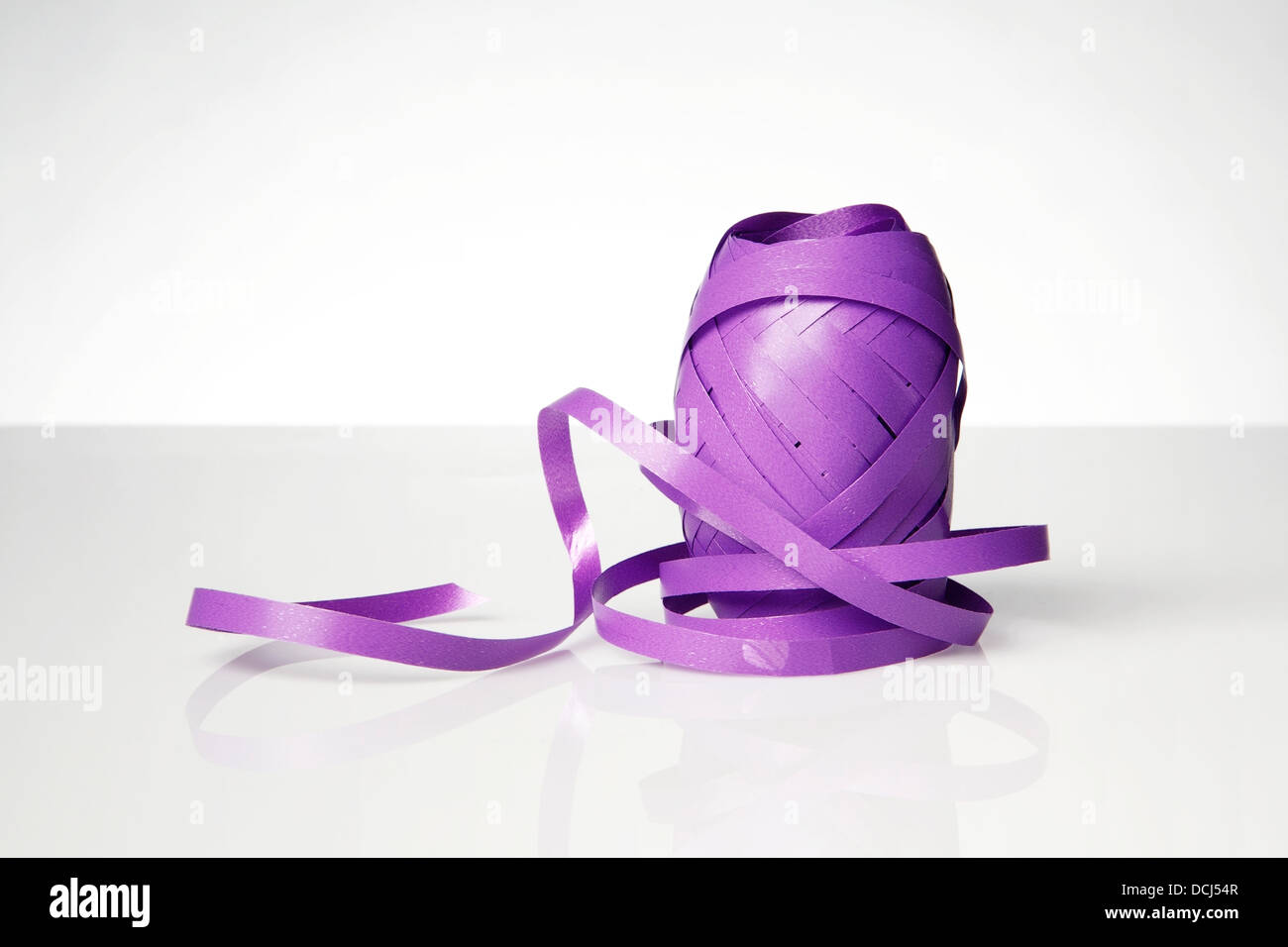 still life image of single ball of wrapping ribbon untangled Stock ...