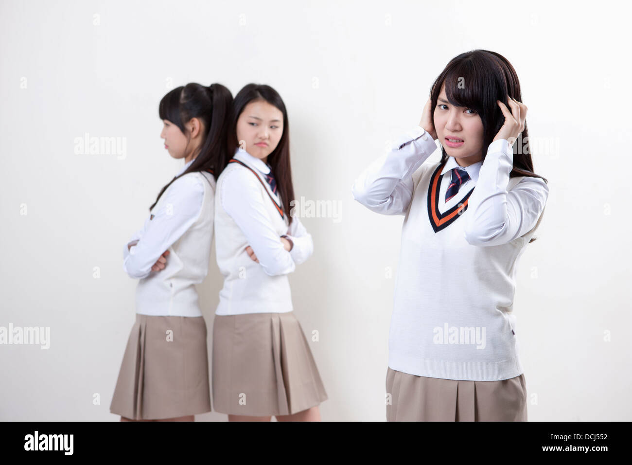 students in uniform staring at each other Stock Photo - Alamy