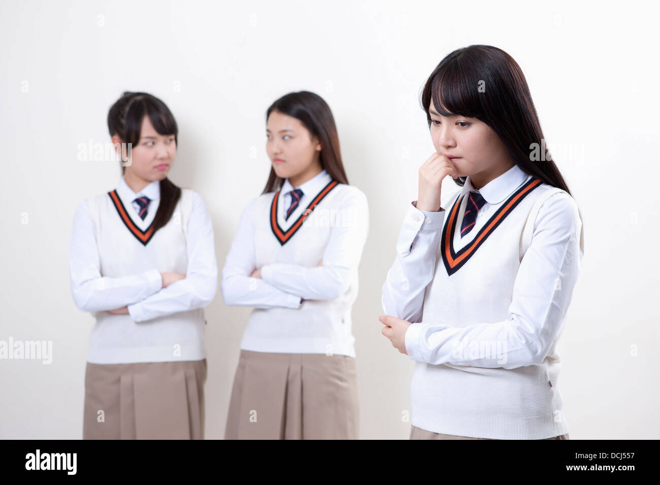 students in uniform staring at each other Stock Photo - Alamy