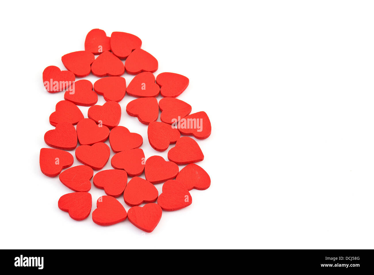 Small hearts on white background Stock Photo - Alamy