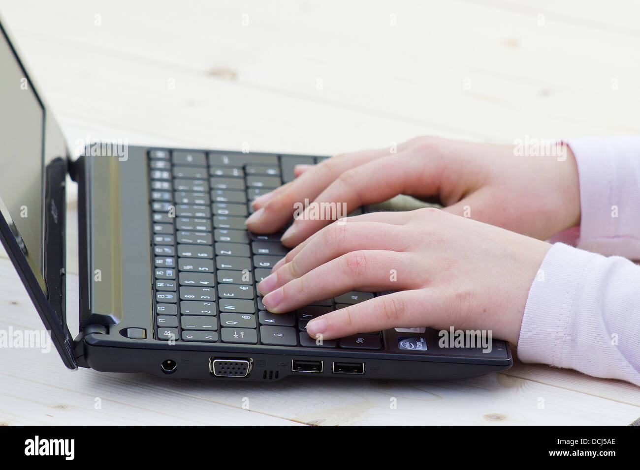 child hands typing on a keyboard of laptop Stock Photo - Alamy