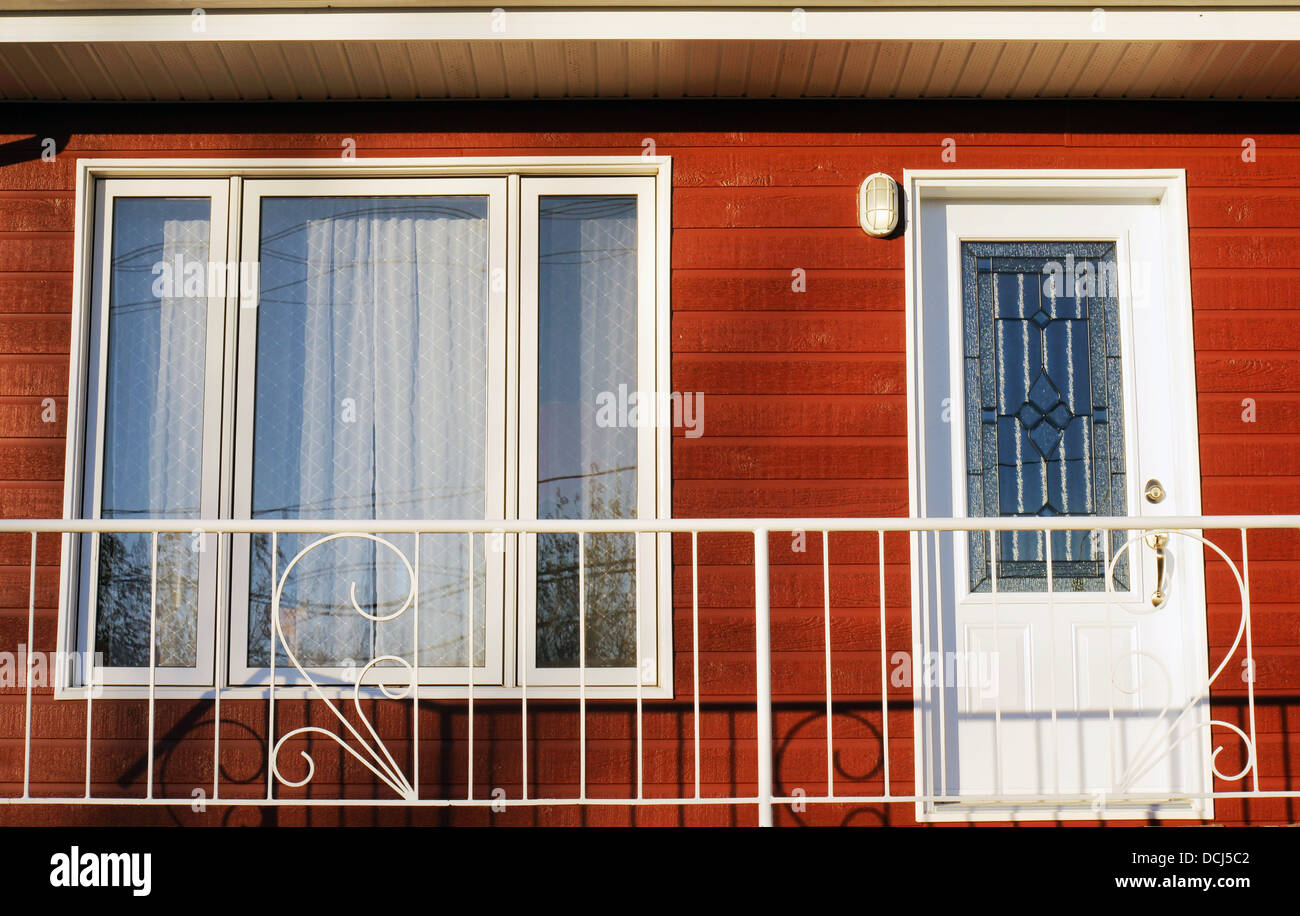 Front of red house Stock Photo - Alamy