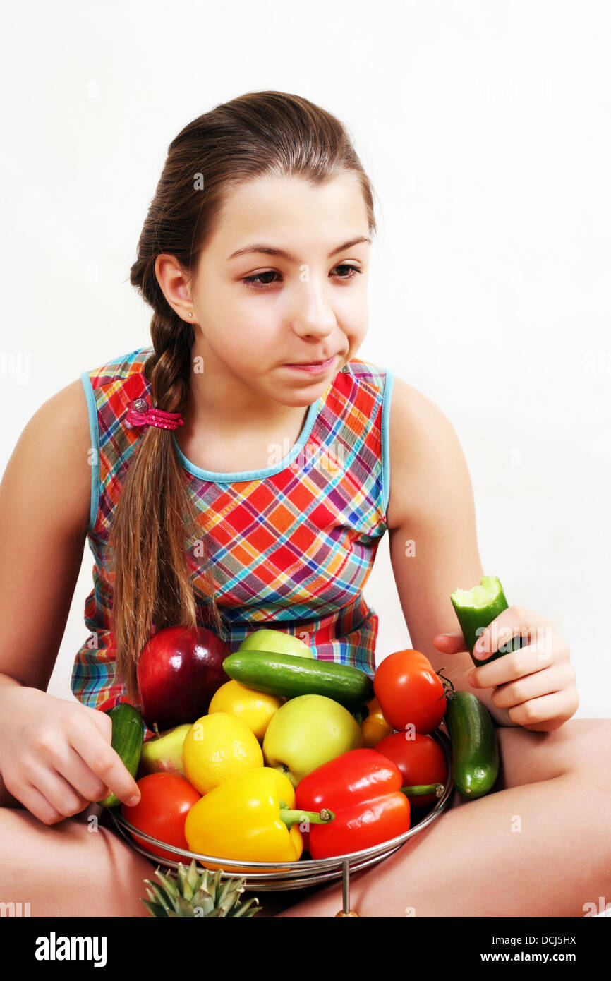 Girl with vegetable and fruit Stock Photo - Alamy