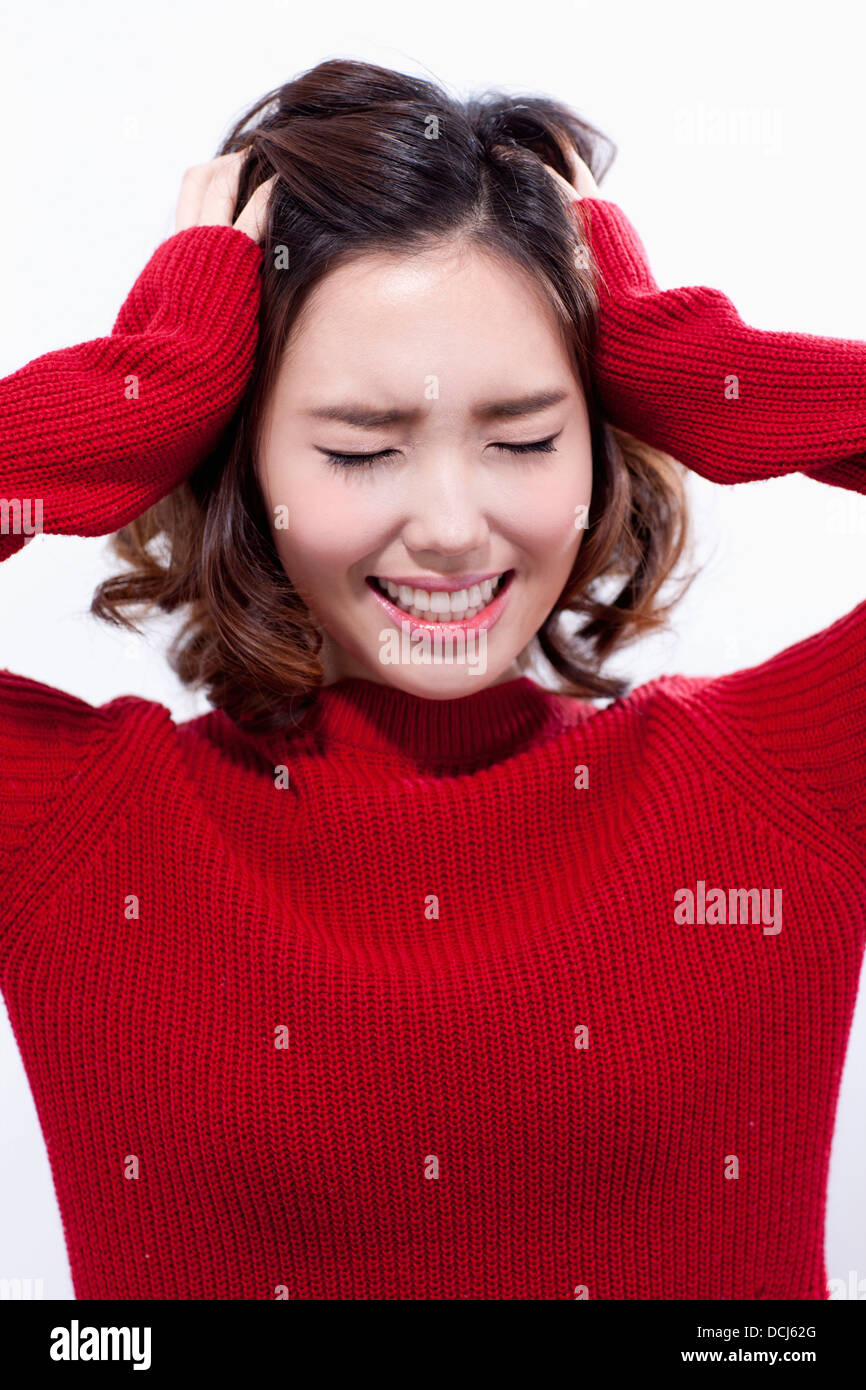 Stressed out asian woman holding hi-res stock photography and images ...