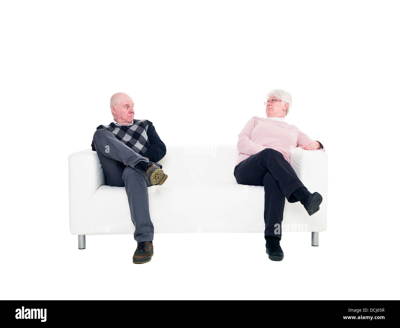 Couple on sofa watching Cut Out Stock Images & Pictures - Alamy