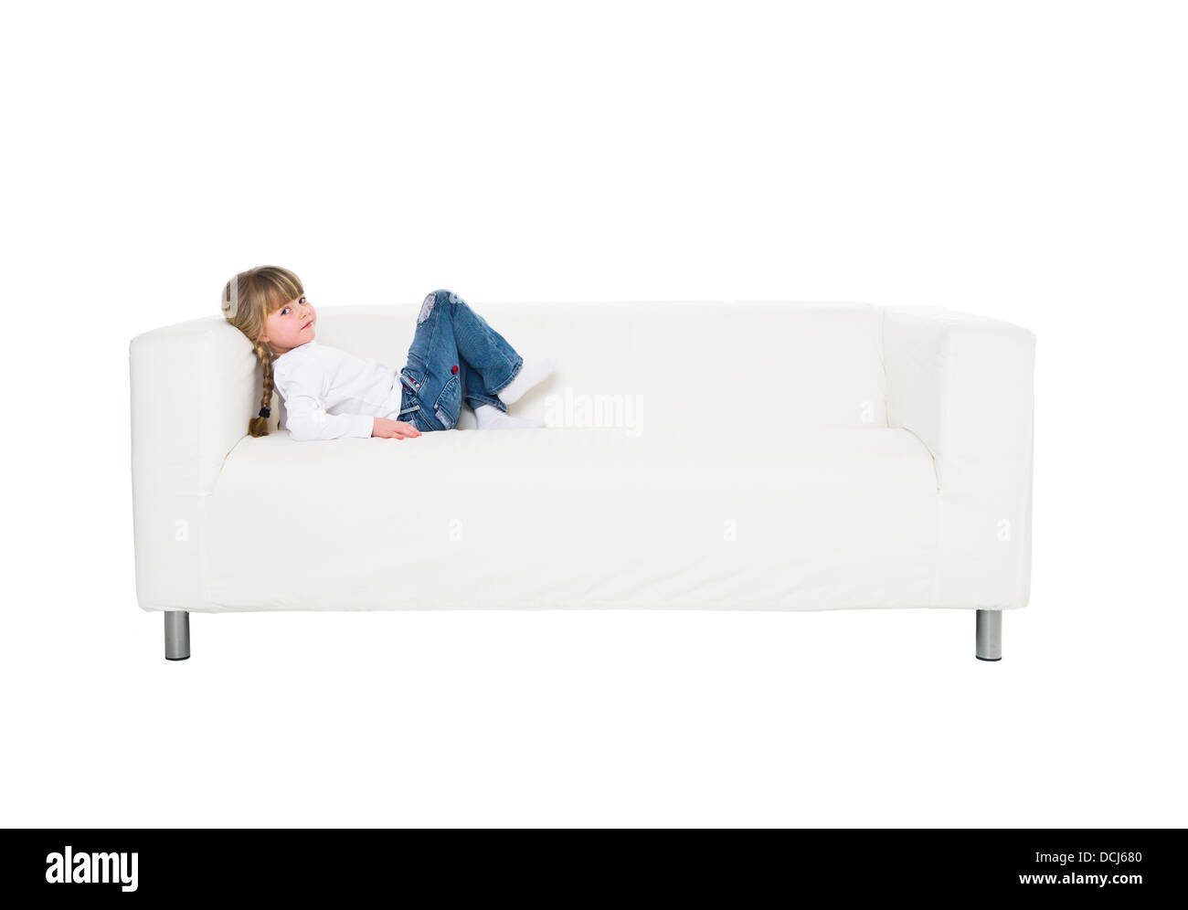 Young girl in a sofa Stock Photo - Alamy