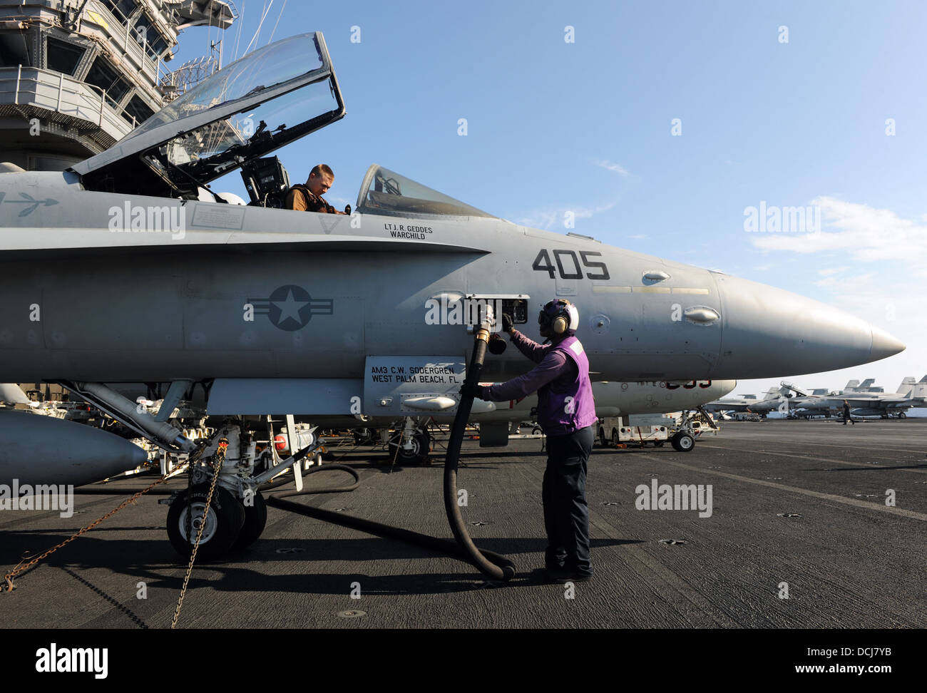 refuels an F/A-18C Hornet assigned to the Valions of Strike Fighter Squadron (VFA) 15 on the ...