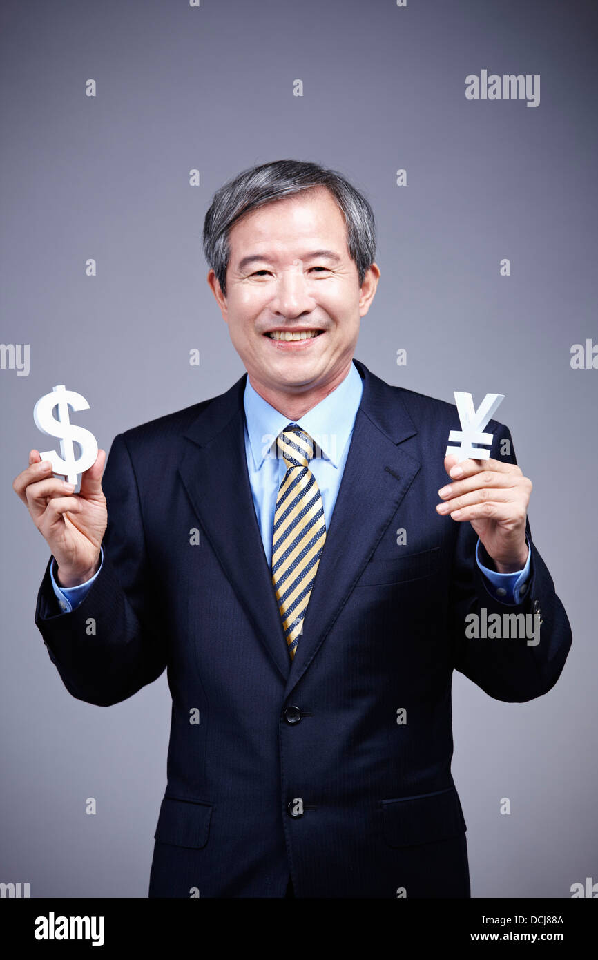 Businessman holding korean currency hi-res stock photography and images ...