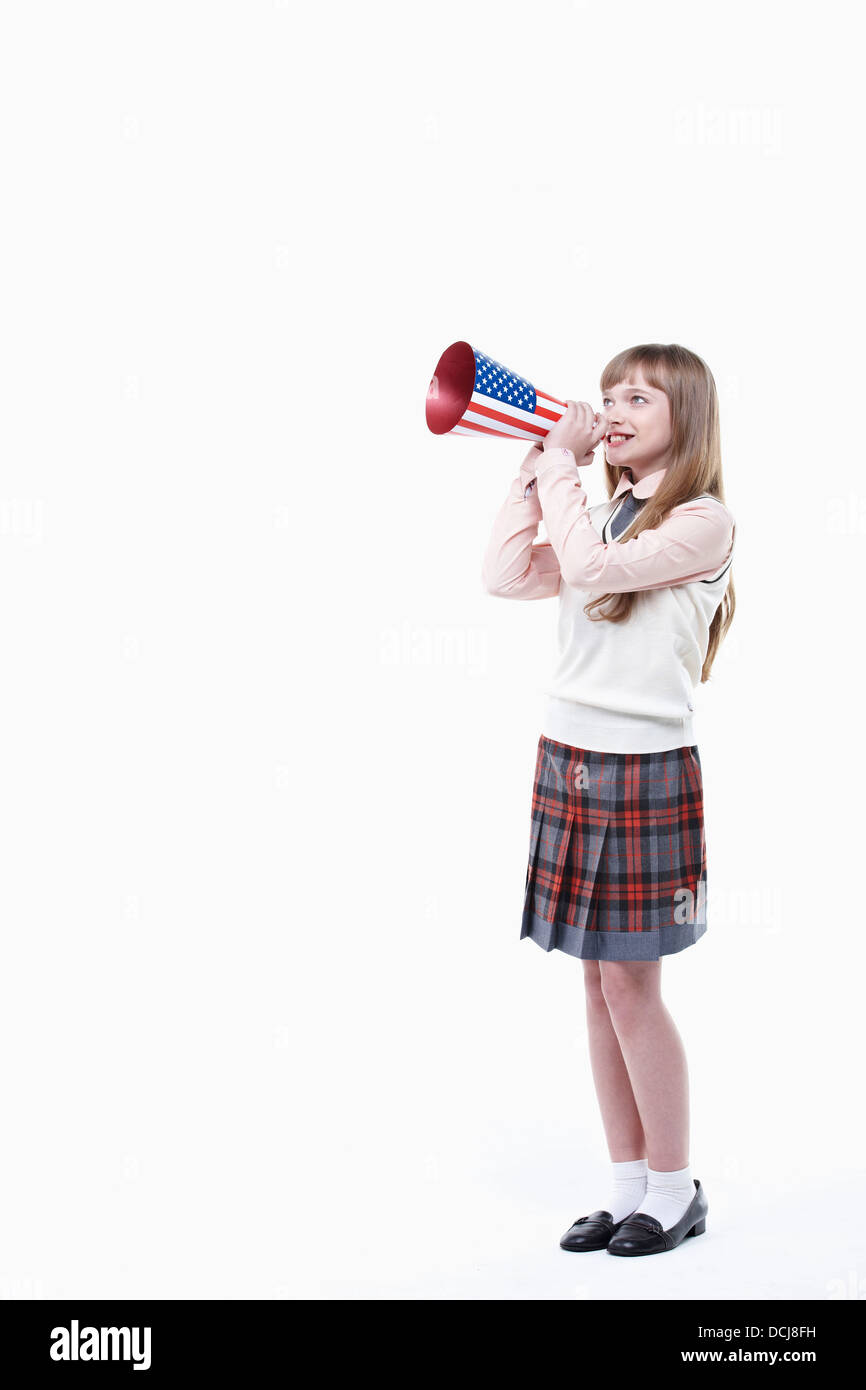 a student in uniform holding a megaphone Stock Photo - Alamy