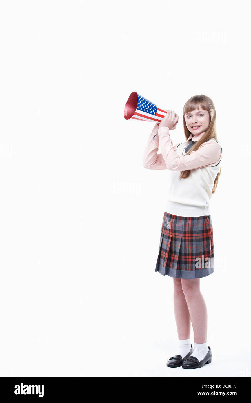 a student in uniform holding a megaphone Stock Photo - Alamy