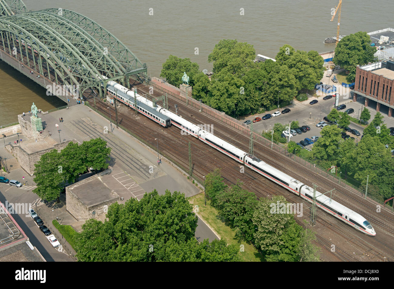 ICE (Intercity Express) passenger train crossing the river Rhine ...
