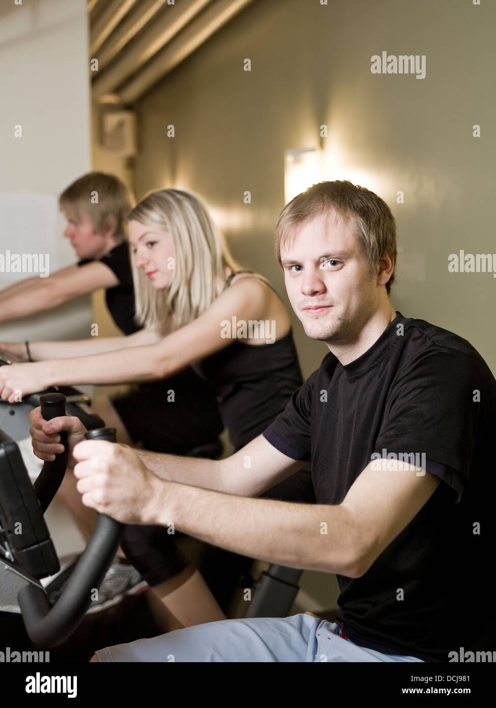 Three people spinning Stock Photo - Alamy