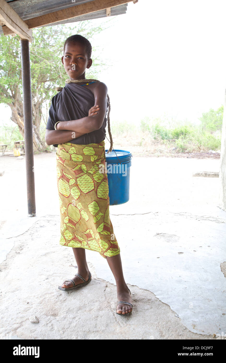 African carrying water bucket hi-res stock photography and images - Alamy
