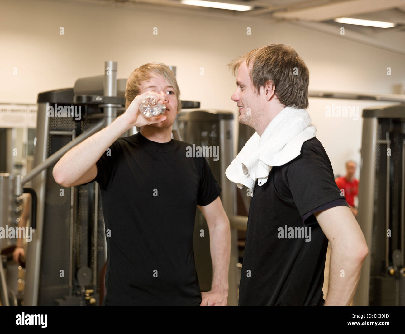 Two young men talking Stock Photo - Alamy Two young men talking Stock Photo - Alamy