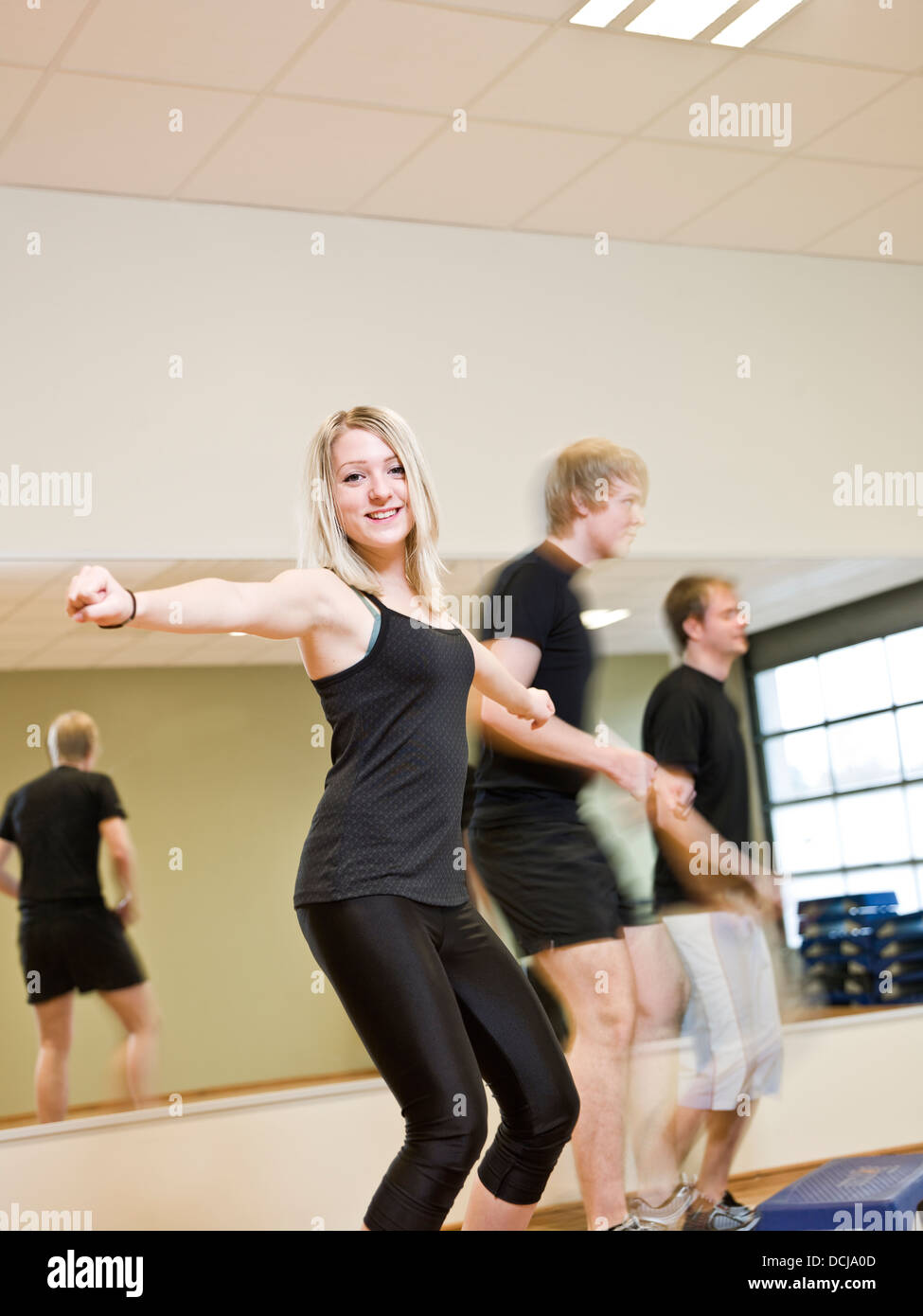 Group of people doing step up Stock Photo - Alamy
