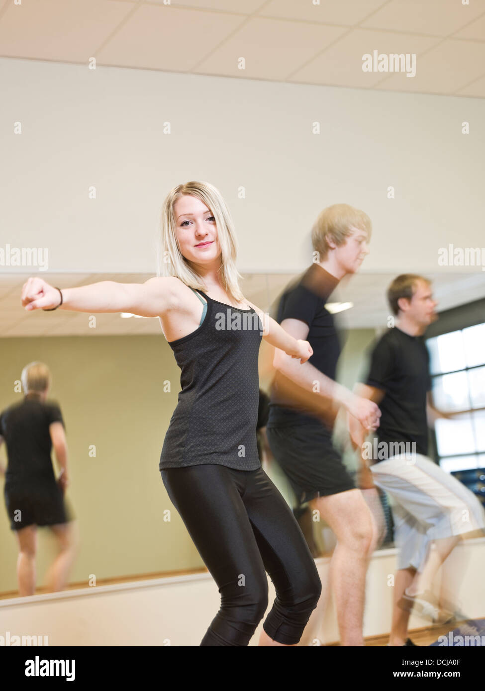 Group of people doing step up Stock Photo - Alamy