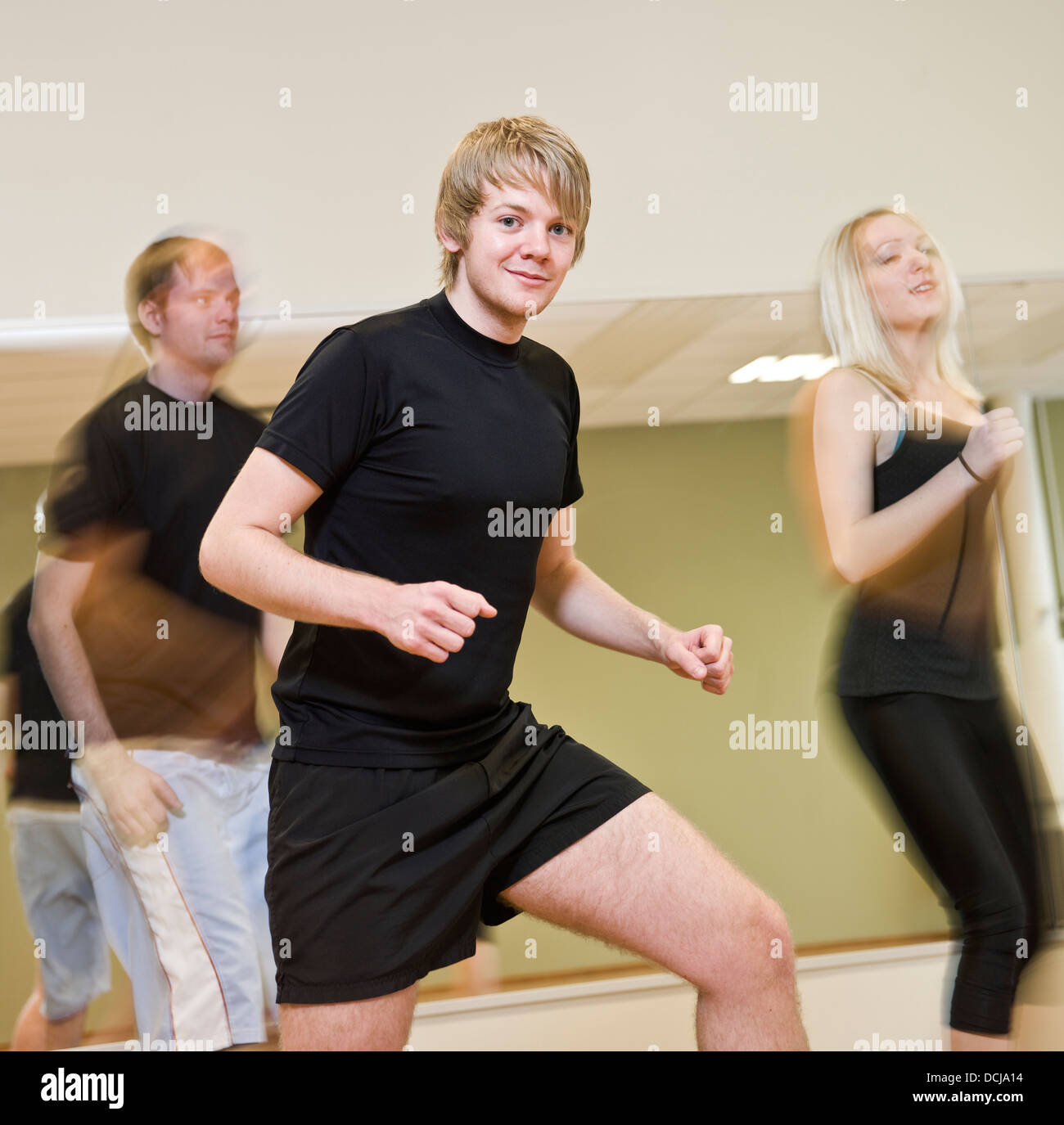 Group of people doing step up Stock Photo - Alamy