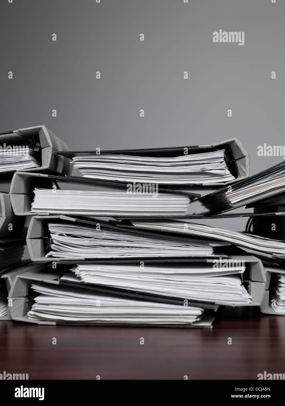 files stacked on a desk Stock Photo - Alamy