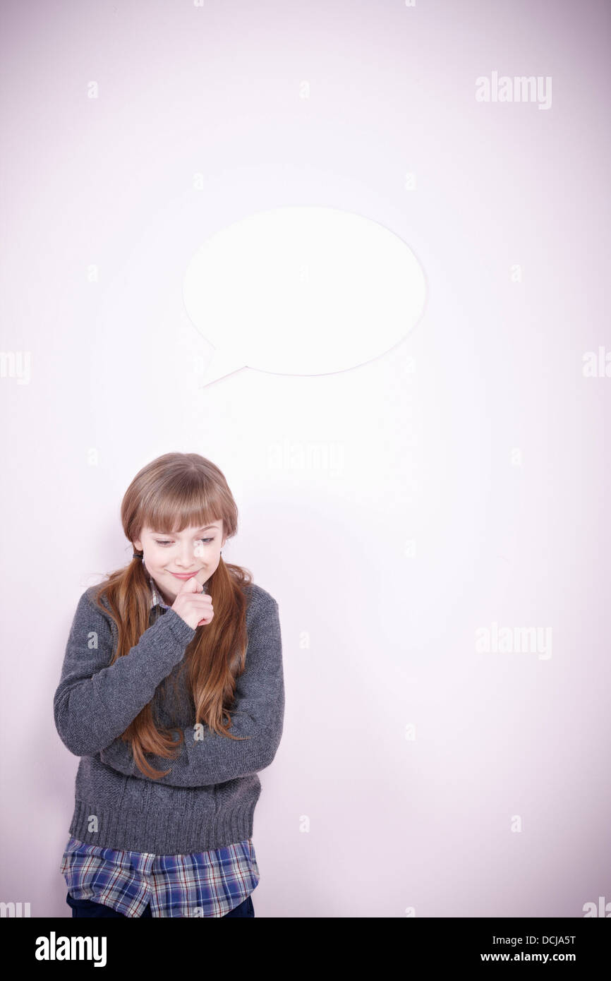 a girl smiling while standing Stock Photo - Alamy