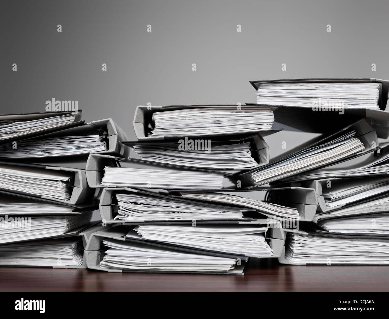 files stacked on a desk Stock Photo - Alamy