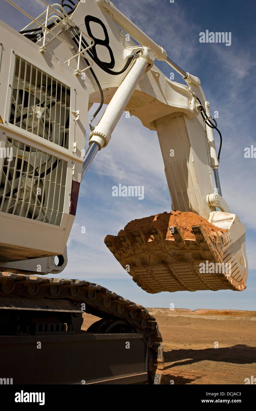 Bucyrus Caterpillar hydraulic excavator digger breaking new ground on a ...